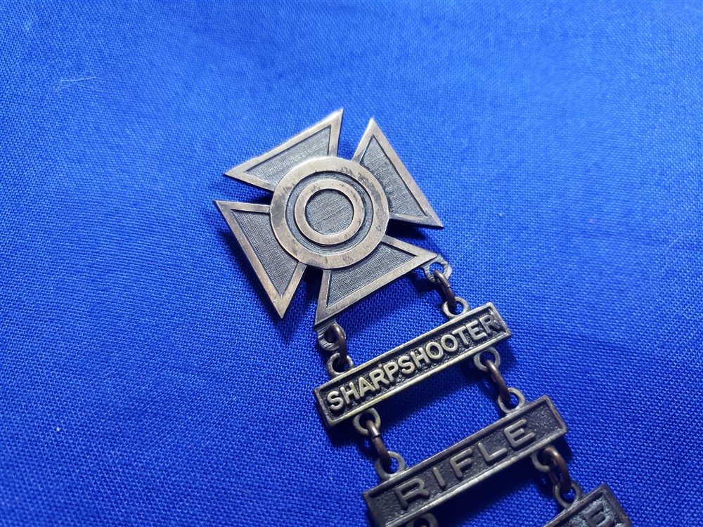 Badge Shrp 9 bars - Doughboy Military Collectables Springfield Missouri
